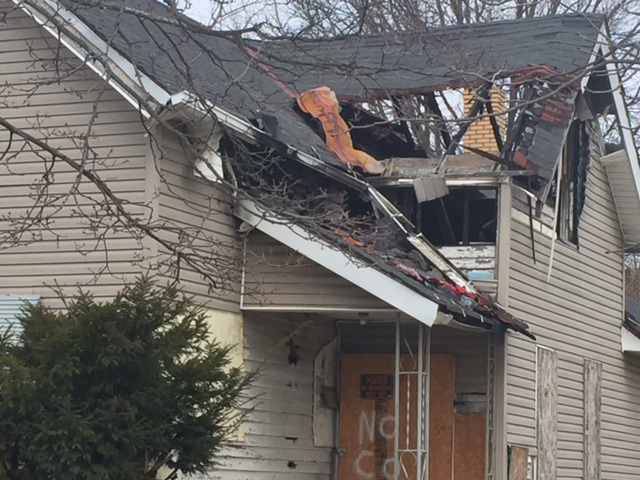 Years after a house went up in flames, neighbors fight to have the ...